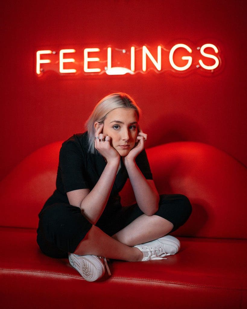 Sitting Poses for Photos: How to Pose Sitting Down - 42West